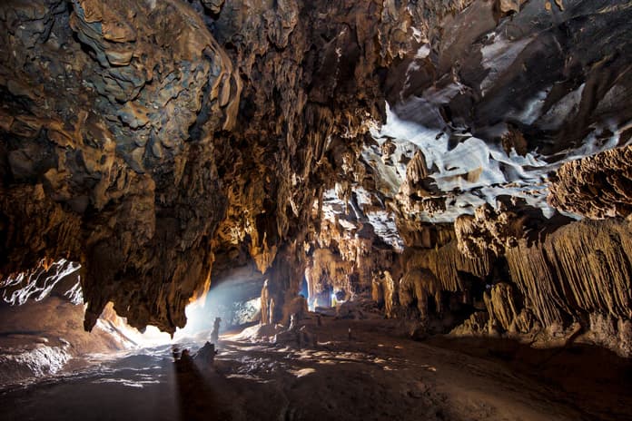 History of the discovery and surveying of the Tu Lan Cave System ...